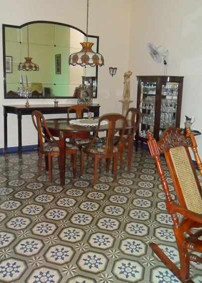 Spacious Cuban Dining Room with Cement Tile Floors